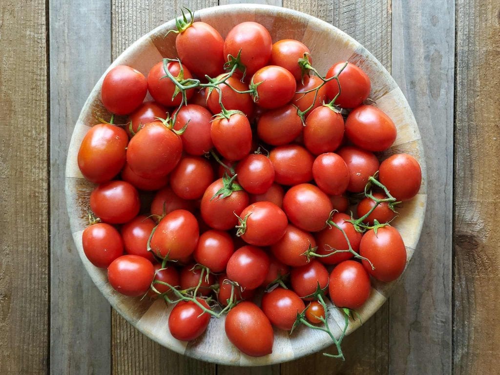How to Freeze Whole Tomatoes for Sauce, Soups and More ~ Homestead and ...